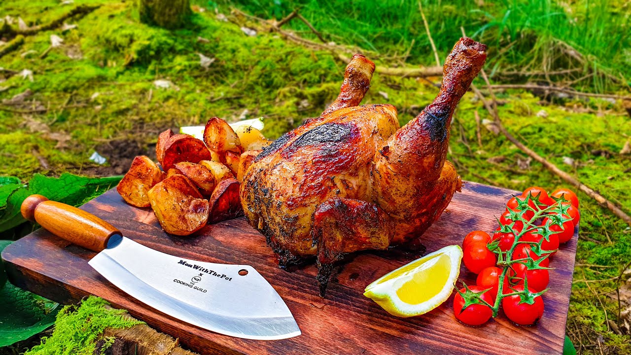 Watch how a whole chicken is prepared slowly in the forest