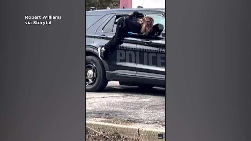 Watch: Michigan handcuffed woman escapes back of police cruiser