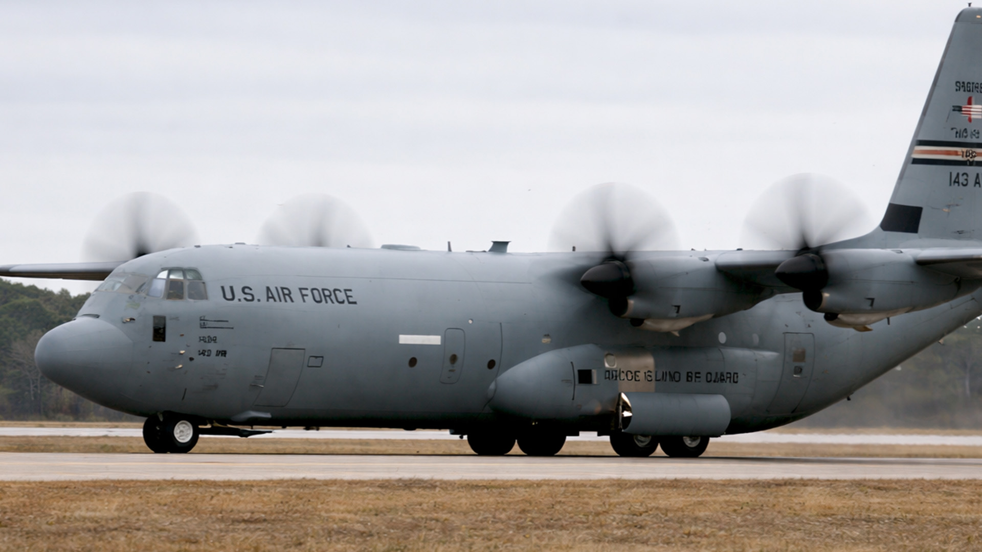 Watch C-130 military transport aircraft land