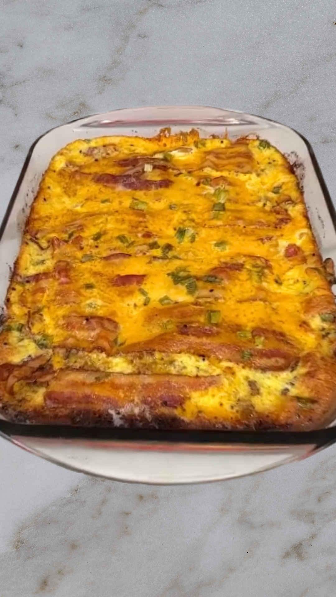 How to make an overnight breakfast casserole with bacon, cheese, and eggs