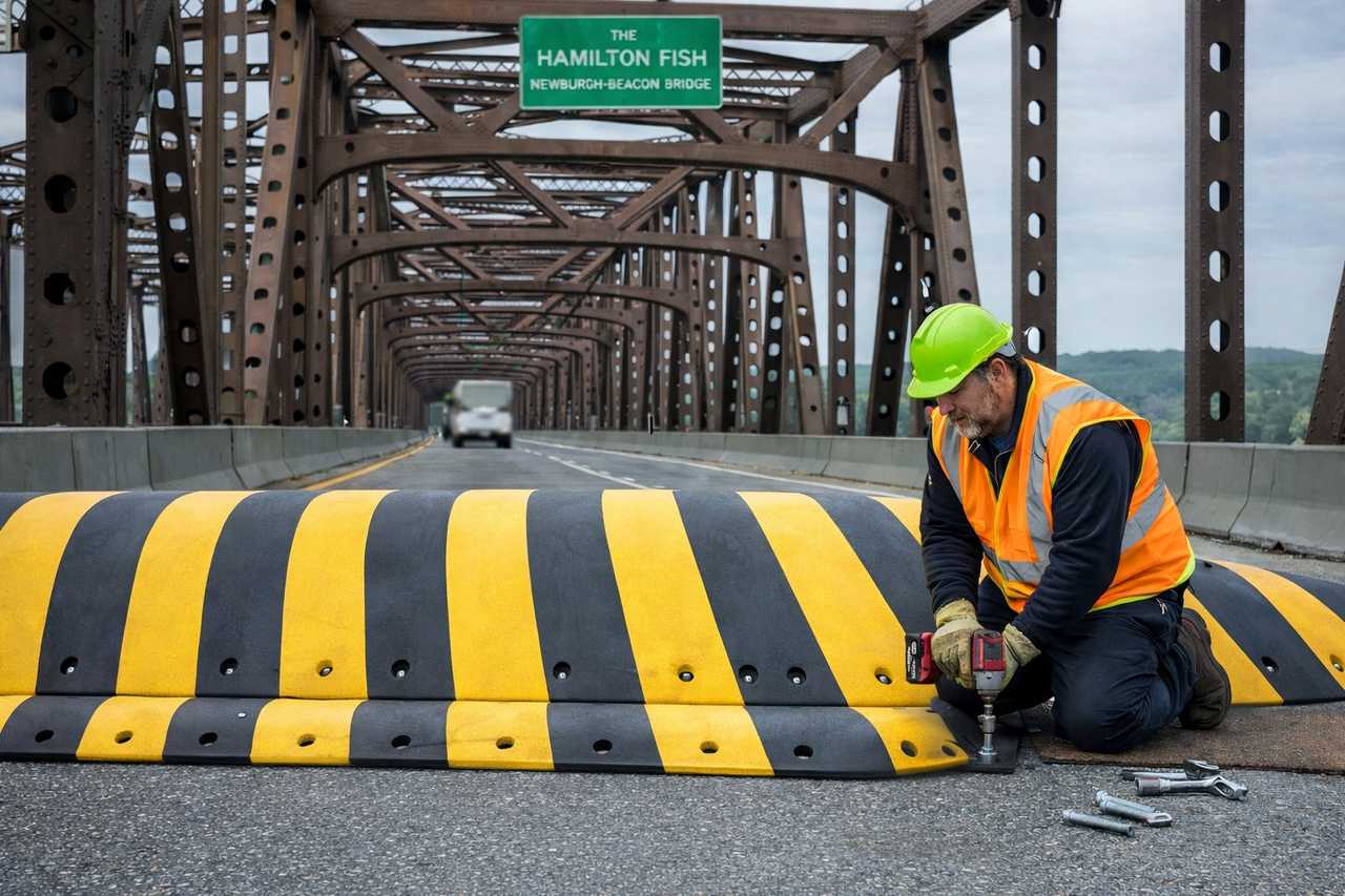 'This is satire, right?' Huge speed bump on NY bridge arrives in time ...