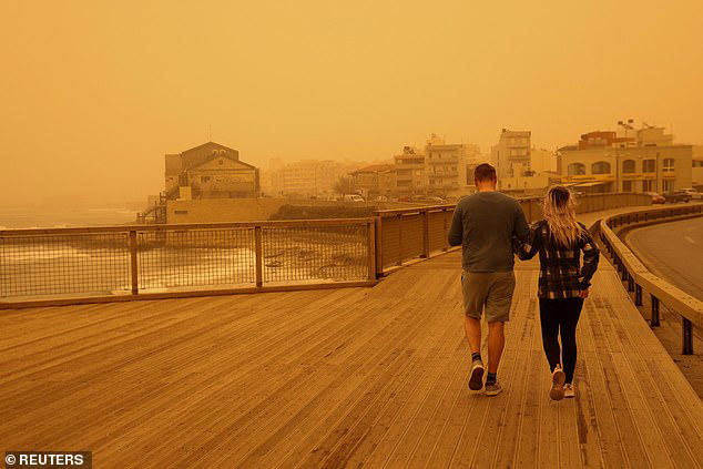 Greek island cloaked by Saharan dust storm and hit by tornados with ...