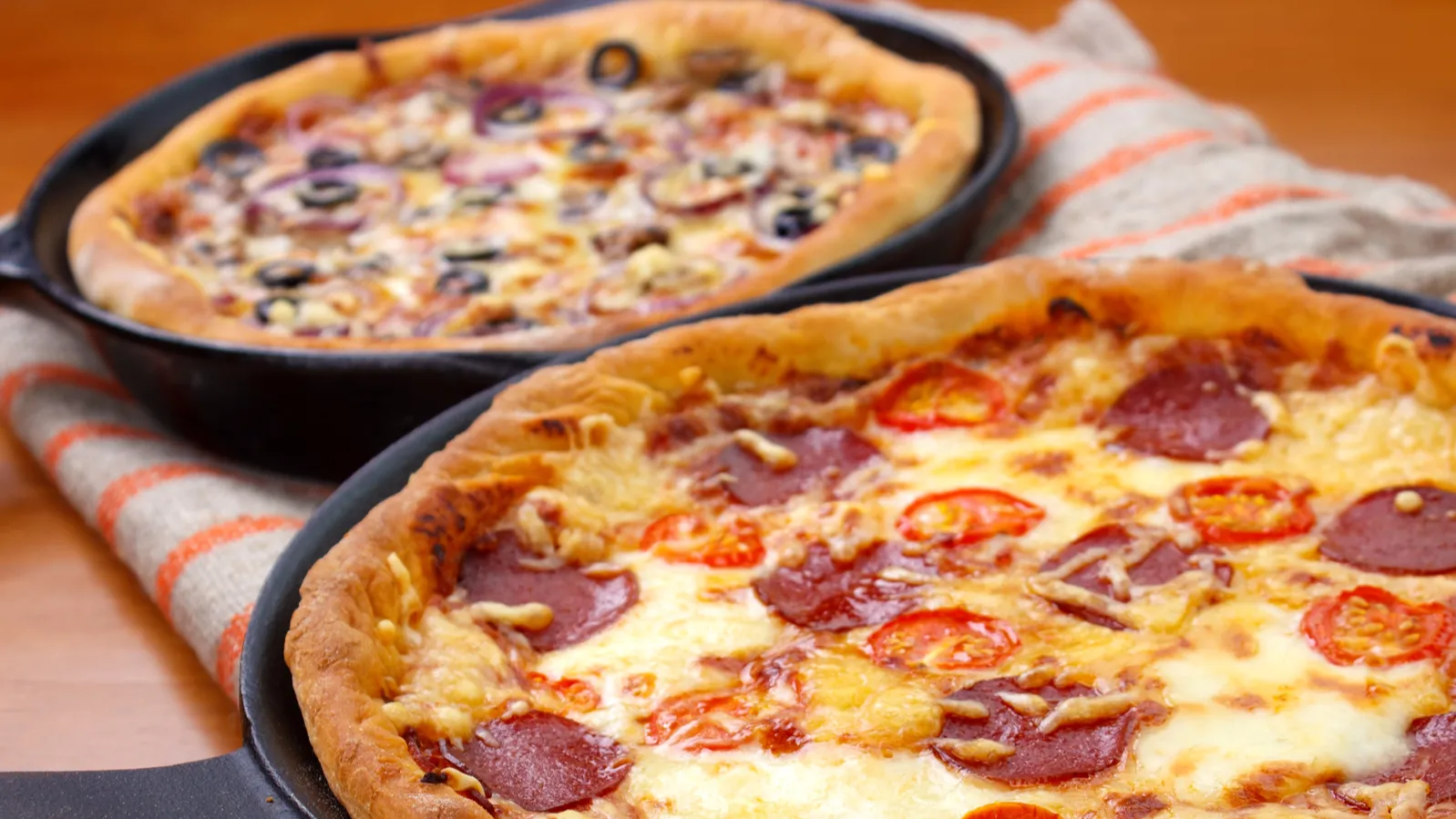Pizza Hut’s new crispy parm pan pizza is bringing a little extra drama ...