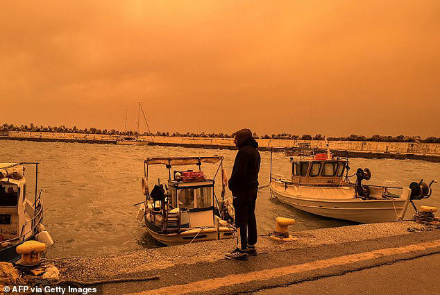 Greek island cloaked by Saharan dust storm and hit by tornados with ...