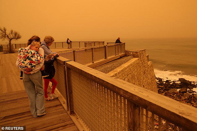 Greek island cloaked by Saharan dust storm and hit by tornados with ...