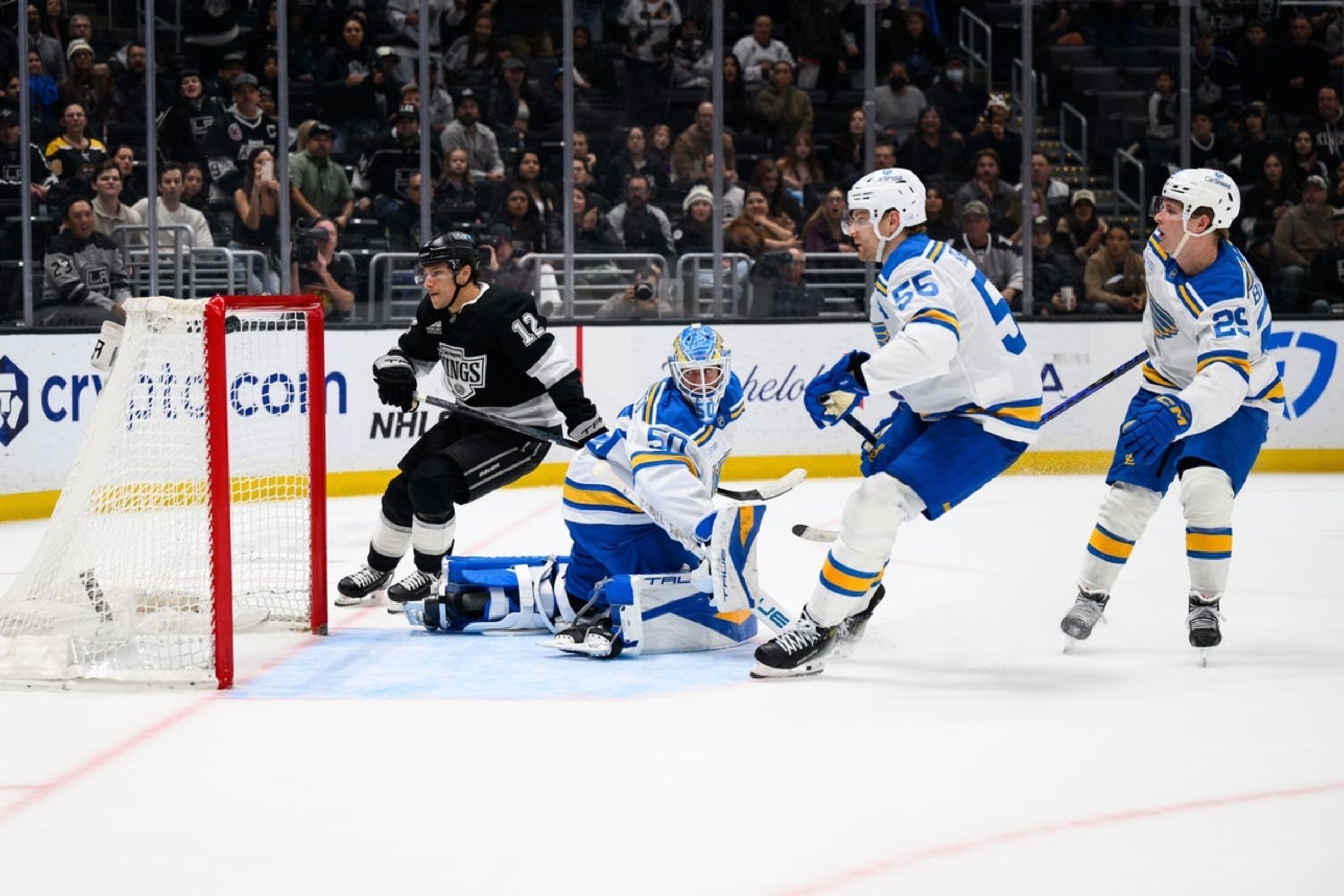 Kings top Blues in OT, hold West's 2nd wild-card spot