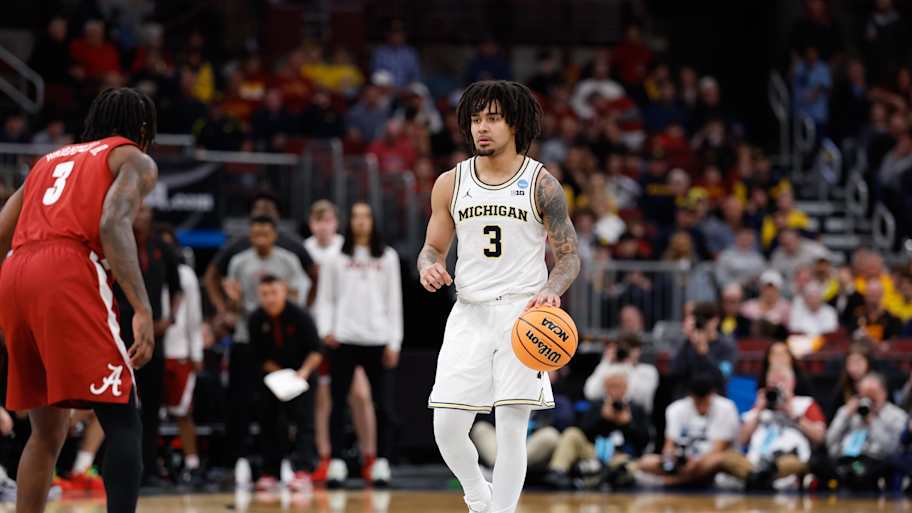 Michigan point guard receives medical treatment before traveling to ...