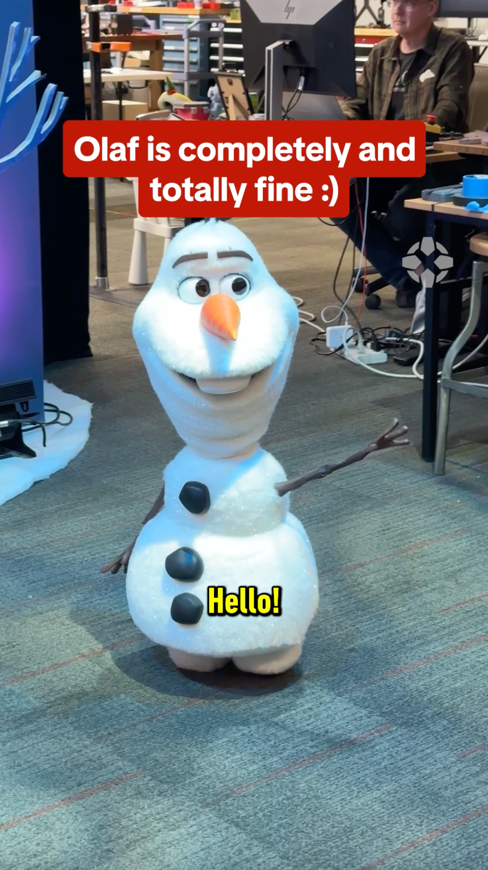 Olaf walking around the Walt Disney Imagineering office