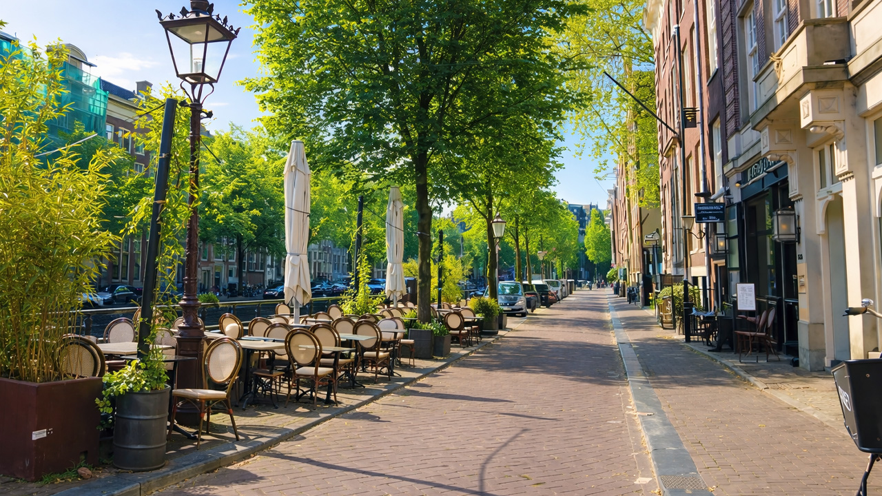 Walking past cafes on a peaceful Amsterdam day