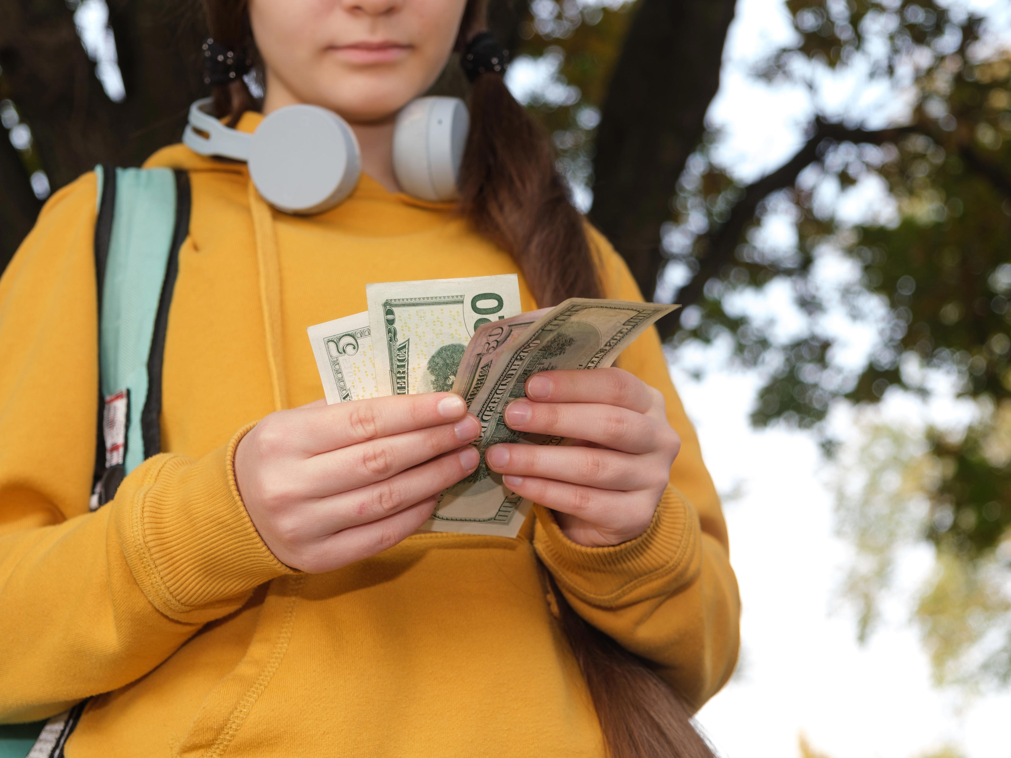 My 17-year-old has her first job. She's learning how to save, and I ...