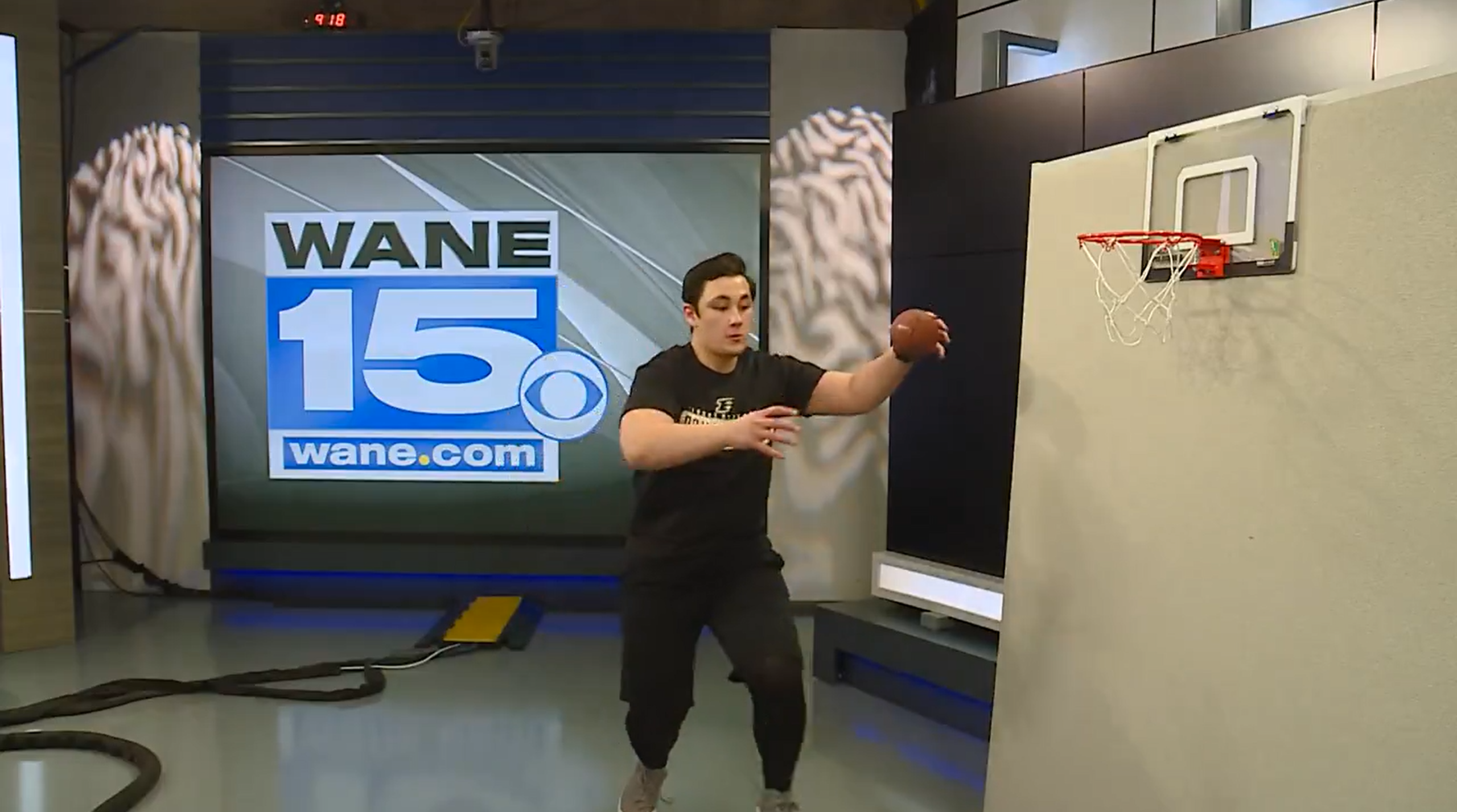 TV anchor acts out basketball highlights due to NCAA restrictions