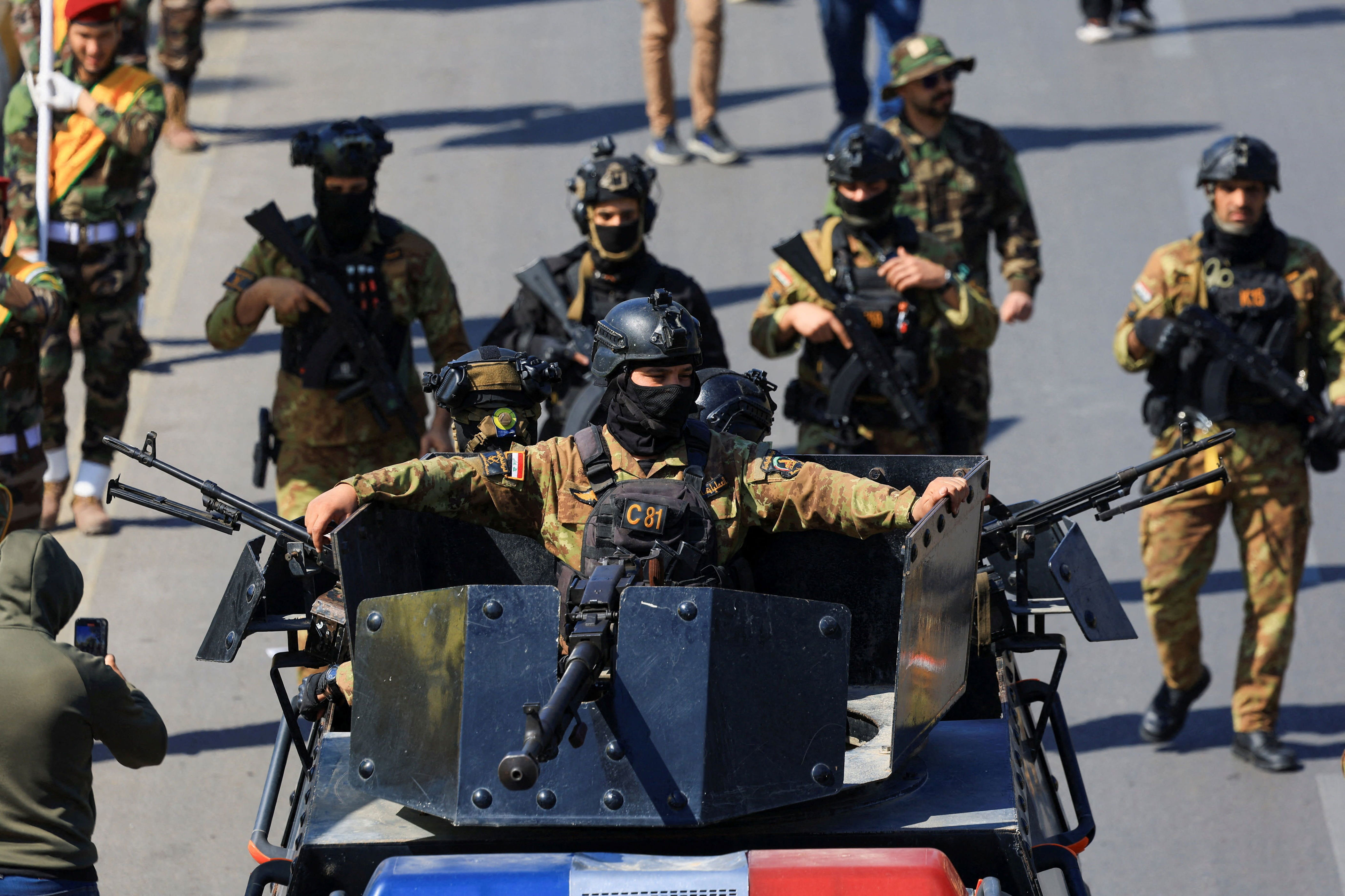Are Iranian-backed militias in Iraq really ready to hand over weapons?