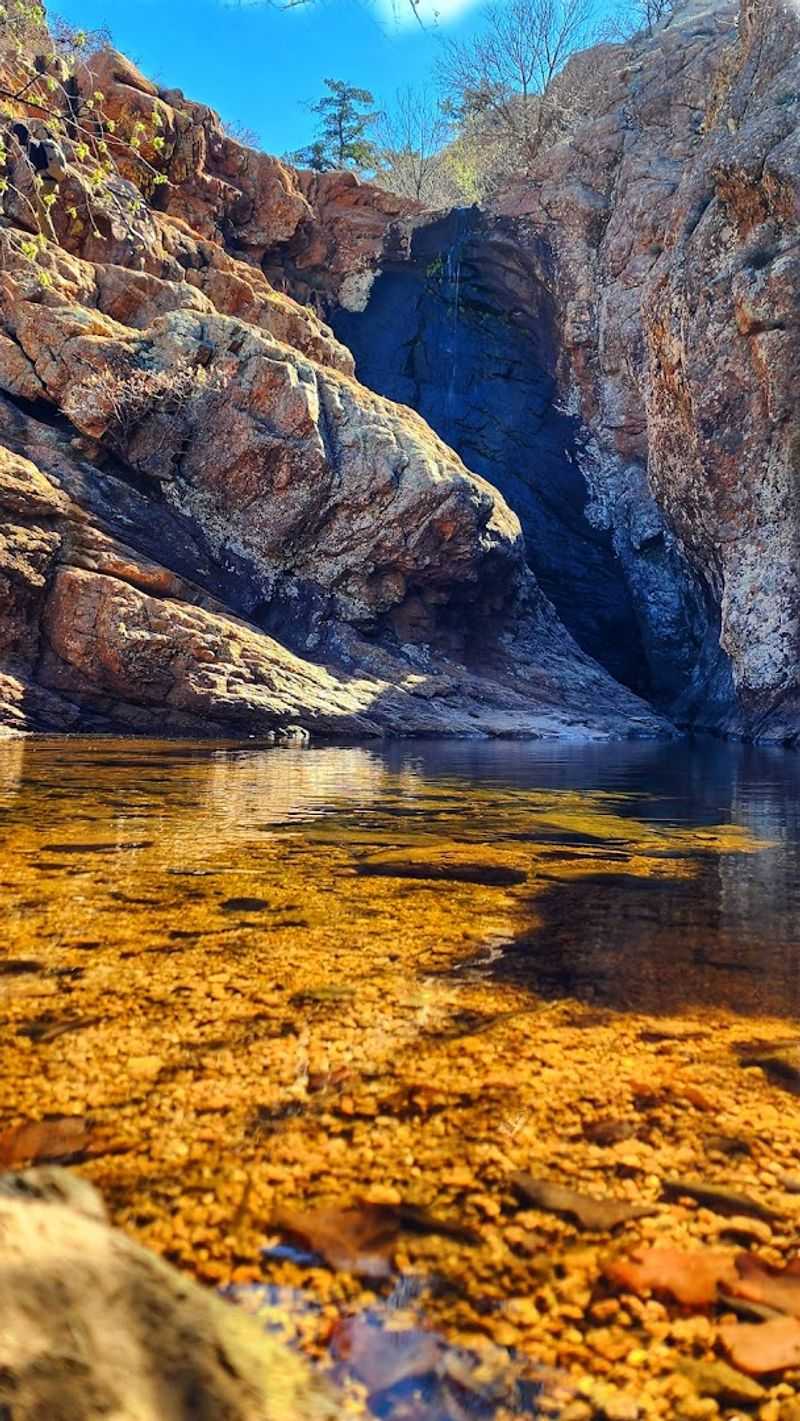This waterfall trail leads you through rocky forests to a hidden oasis ...