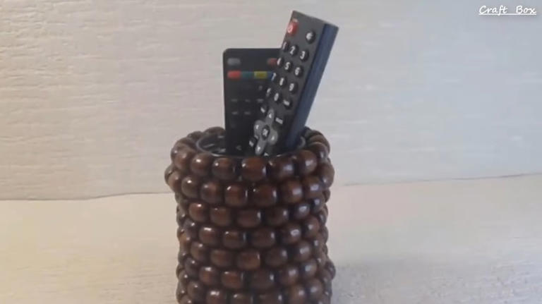 The adorable glass jar idea that keeps your TV remotes tidy