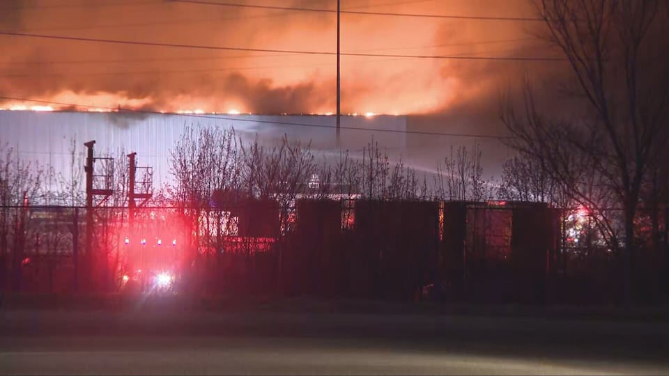 Neighbors react after seeing smoke, flames at Fuyao factory