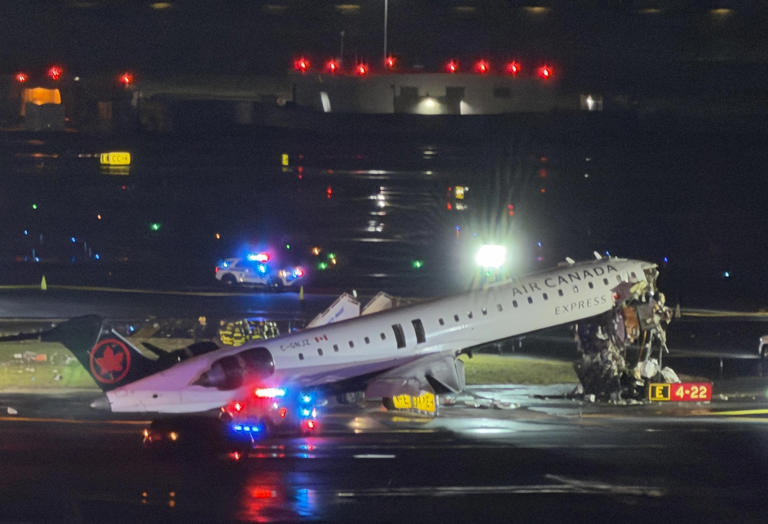 2 pilots killed as plane and fire-rescue truck collide at LaGuardia Airport