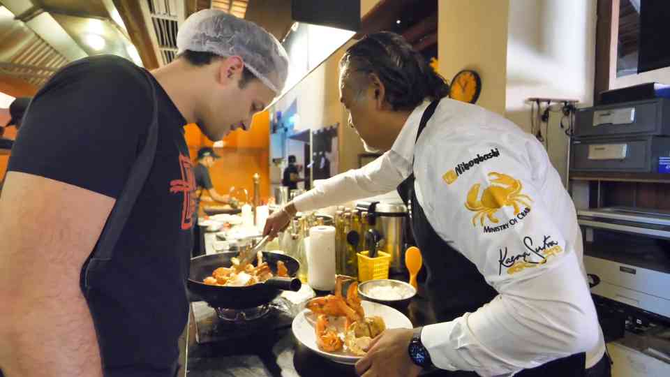 Giant mud crabs cooked in thick spicy curry with rich sauce in Colombo