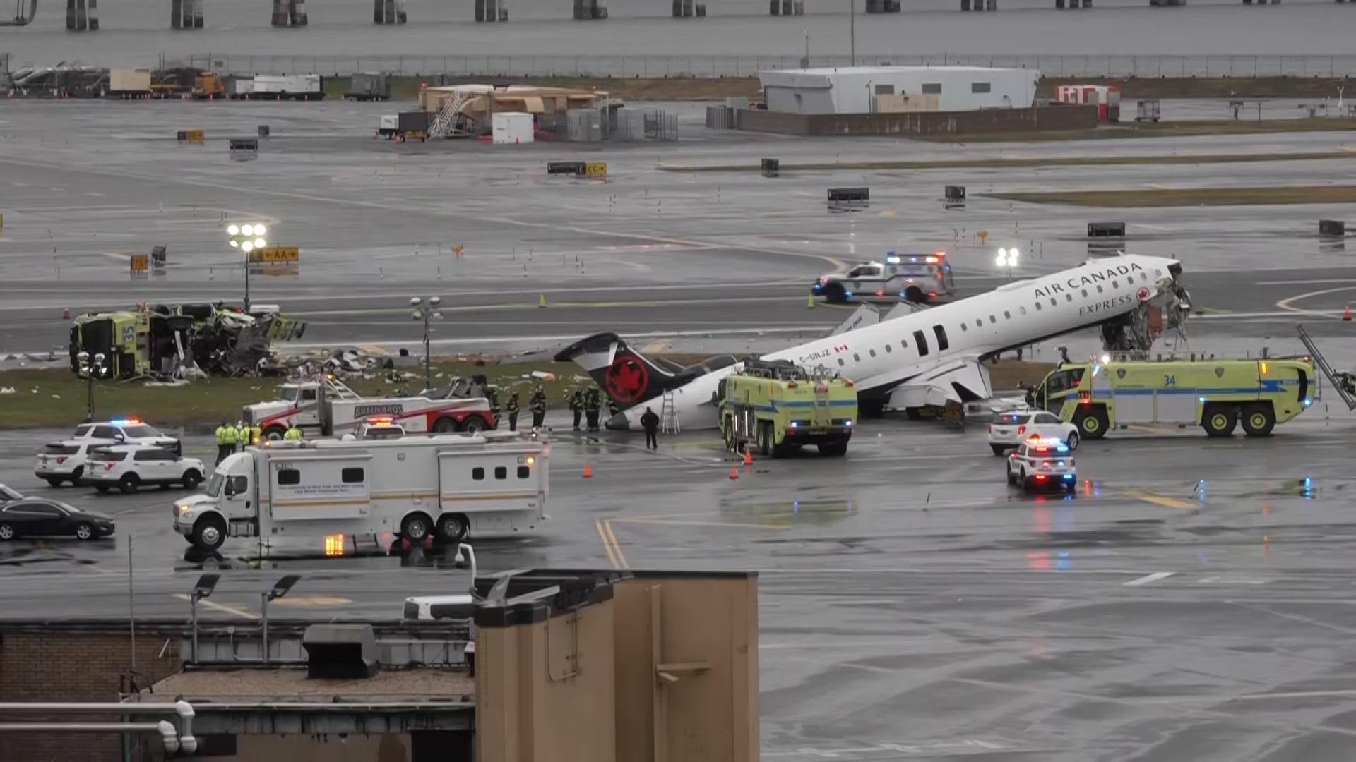 Pilot and copilot killed in collision between jet and fire truck at New ...