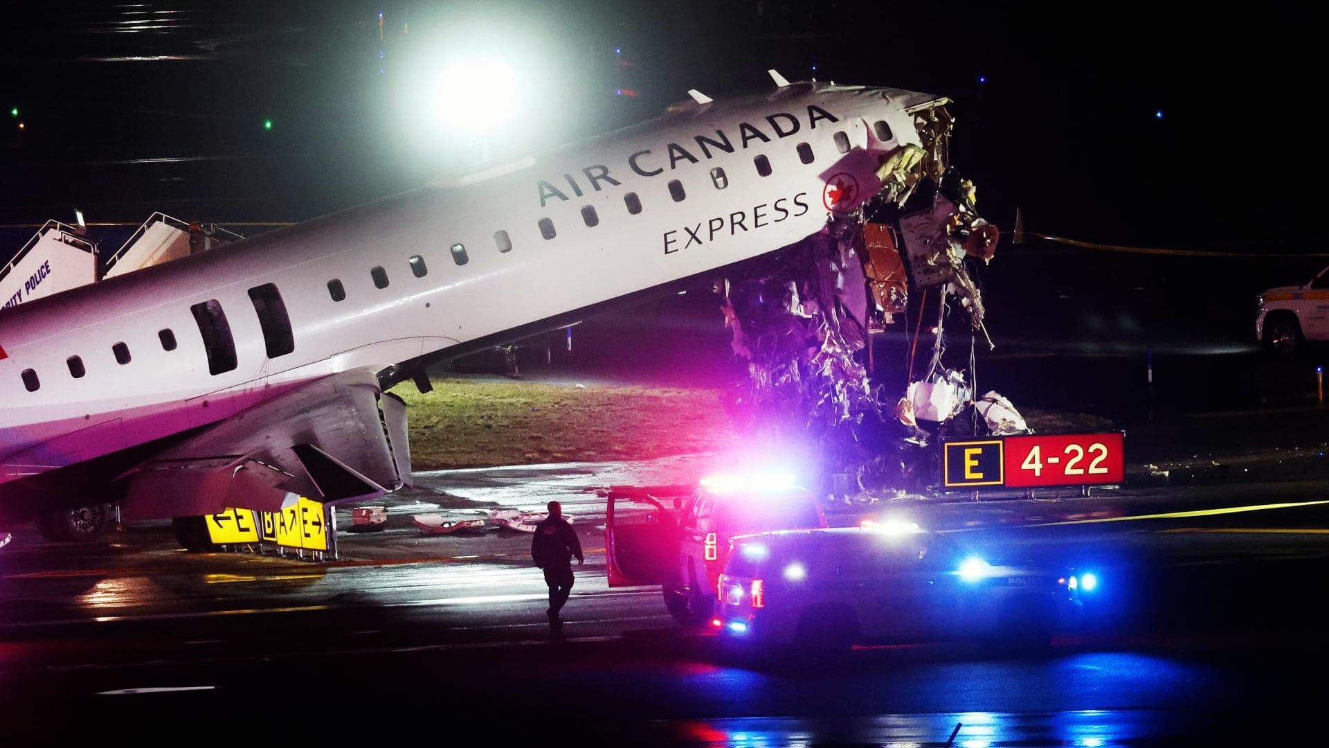 2 dead after plane hits fire truck at LaGuardia Airport