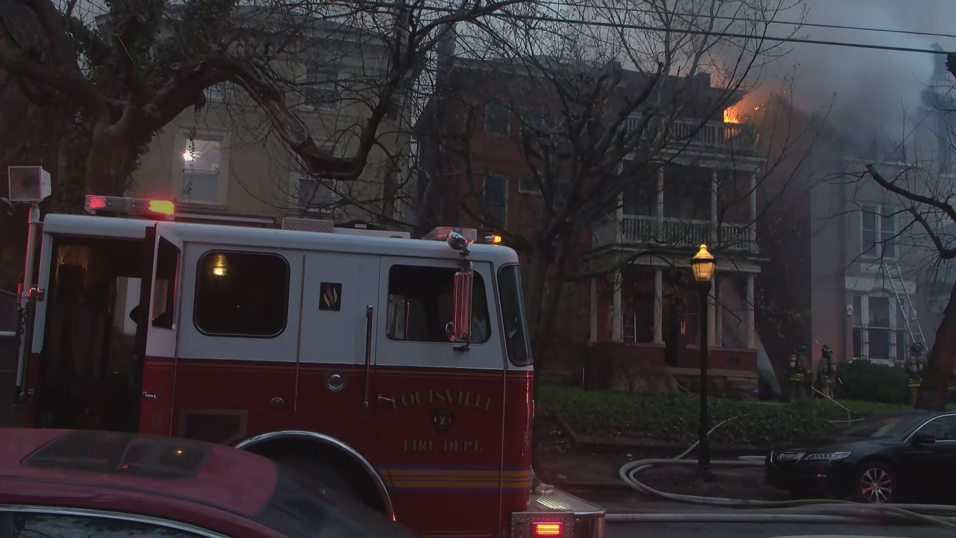 Firefighters battle two-alarm fire in Old Louisville home