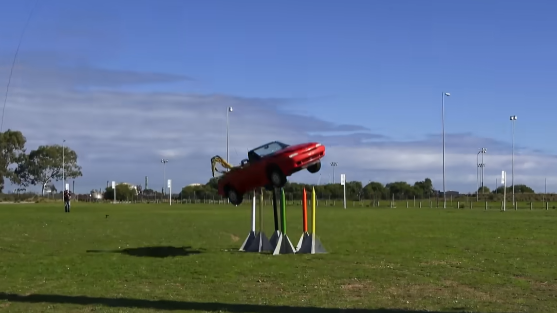 Watch what happens when you drop a car onto giant spikes from 150 ft