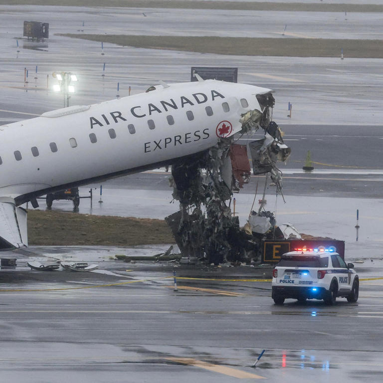 2 pilots killed as plane and fire-rescue truck collide at LaGuardia Airport