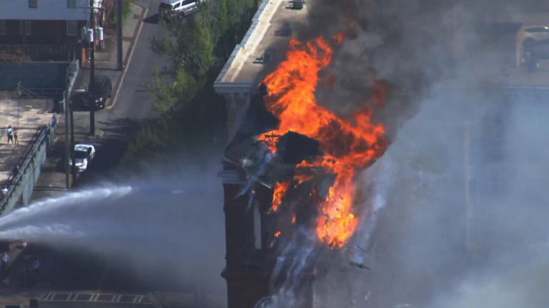 Historic Rome courthouse burns, tower collapses