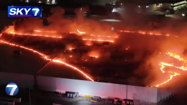 Fire and smoke still visible from roof of Fuyao Glass America facility