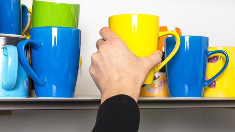 This woman's creative coffee mug storage idea doubles as kitchen decor