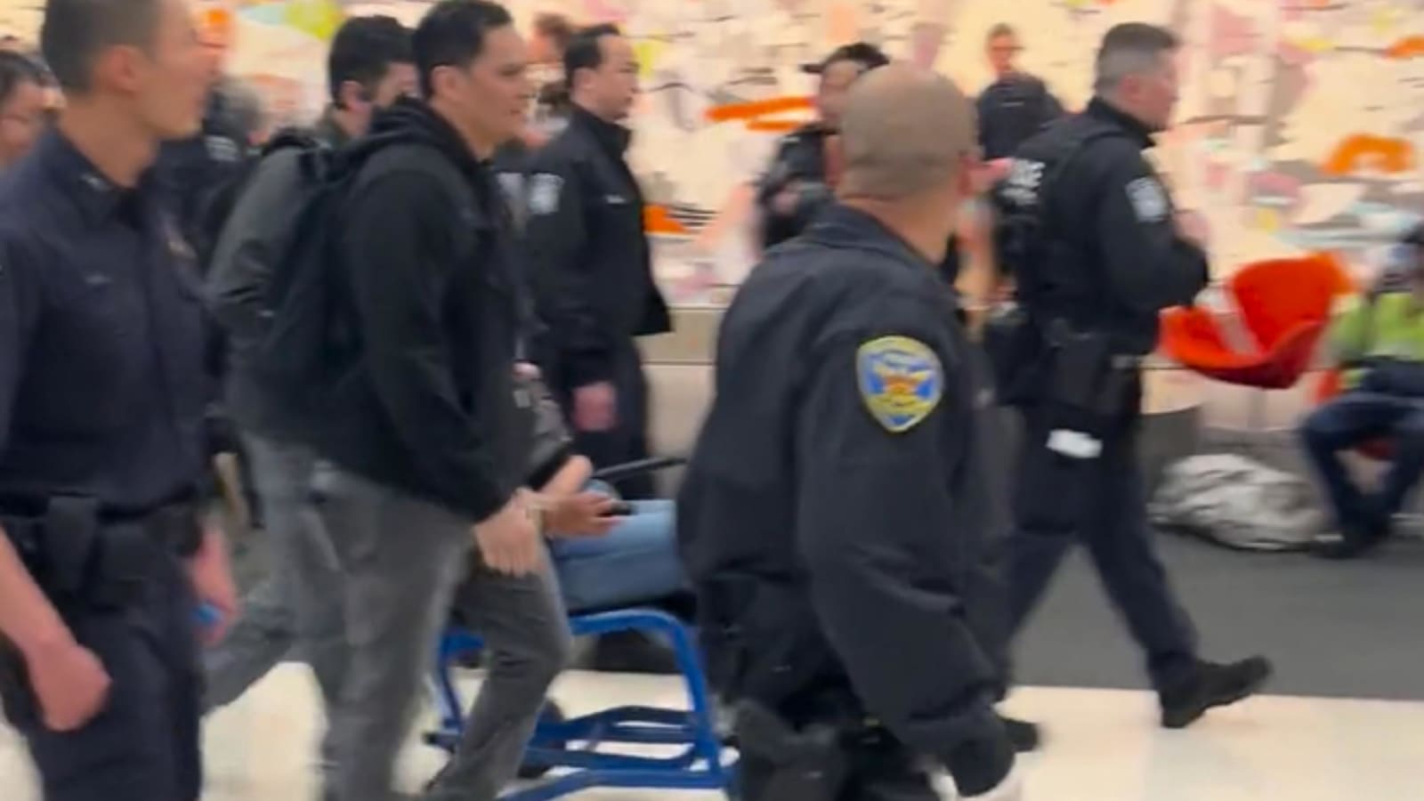 ICE agents under fire as viral SFO video shows mother taken by force in ...