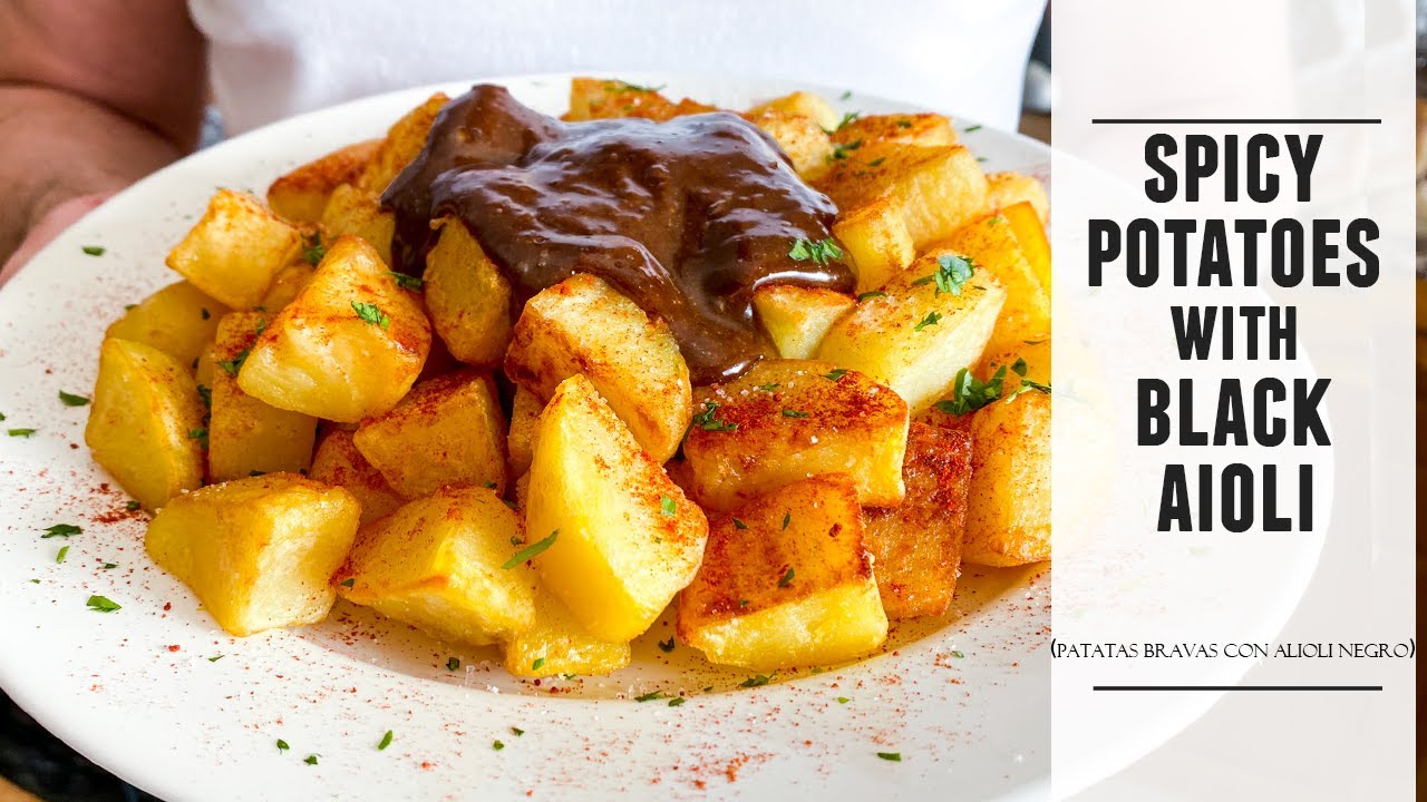 Spanish brave potatoes spicy paprika potatoes with black aioli