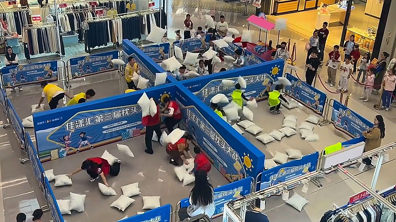 Crowd erupts into chaotic pillow-throwing game during stress relief ...