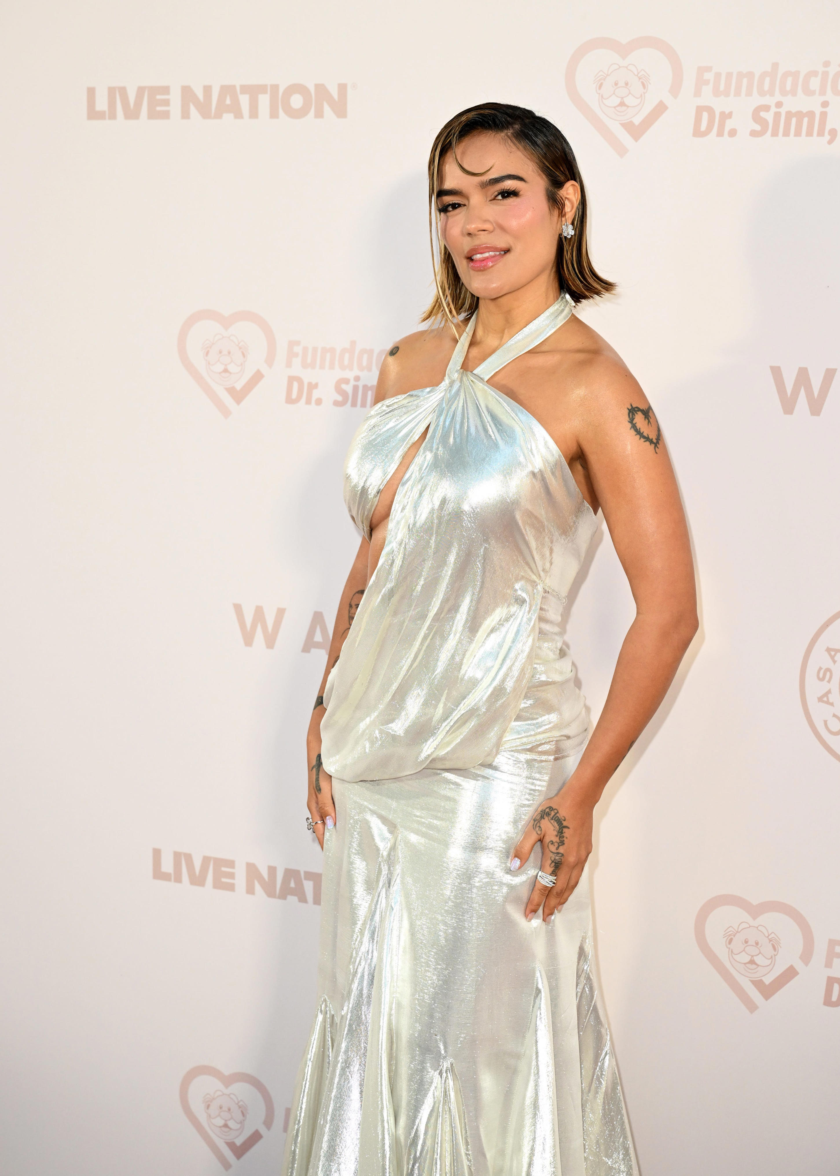 Karol G hosts Con Cora Foundation gala with Alicia Keys, Ciara, more stars