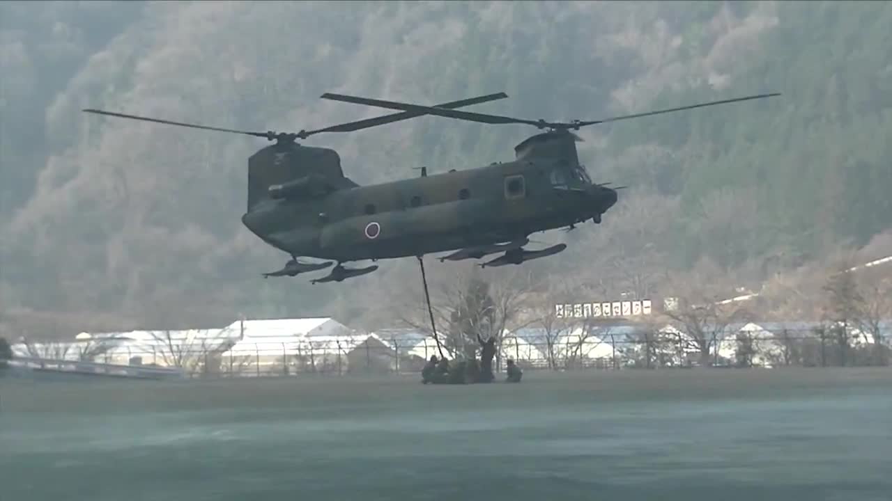 Japanese military deploys helicopters to battle forest fire