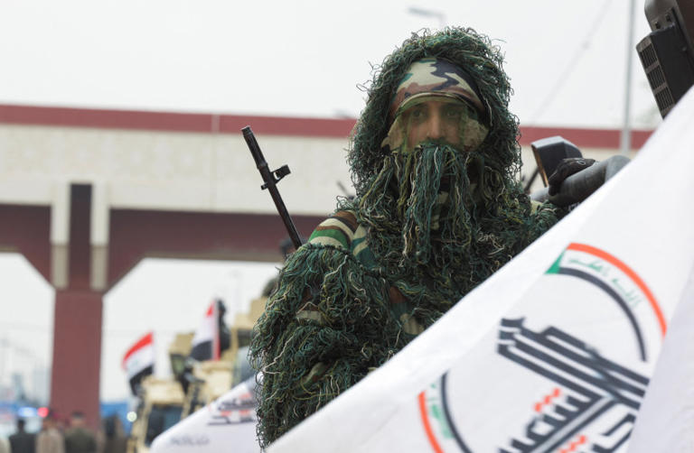 Iranian-backed militias search Iraq for 'Zionist-American' base in show ...