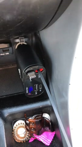 Smart car charger that ends tangled cords in your console
