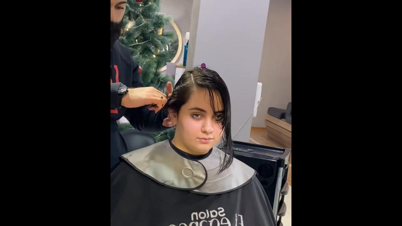 Styling a modern dark brown pixie haircut with natural volume