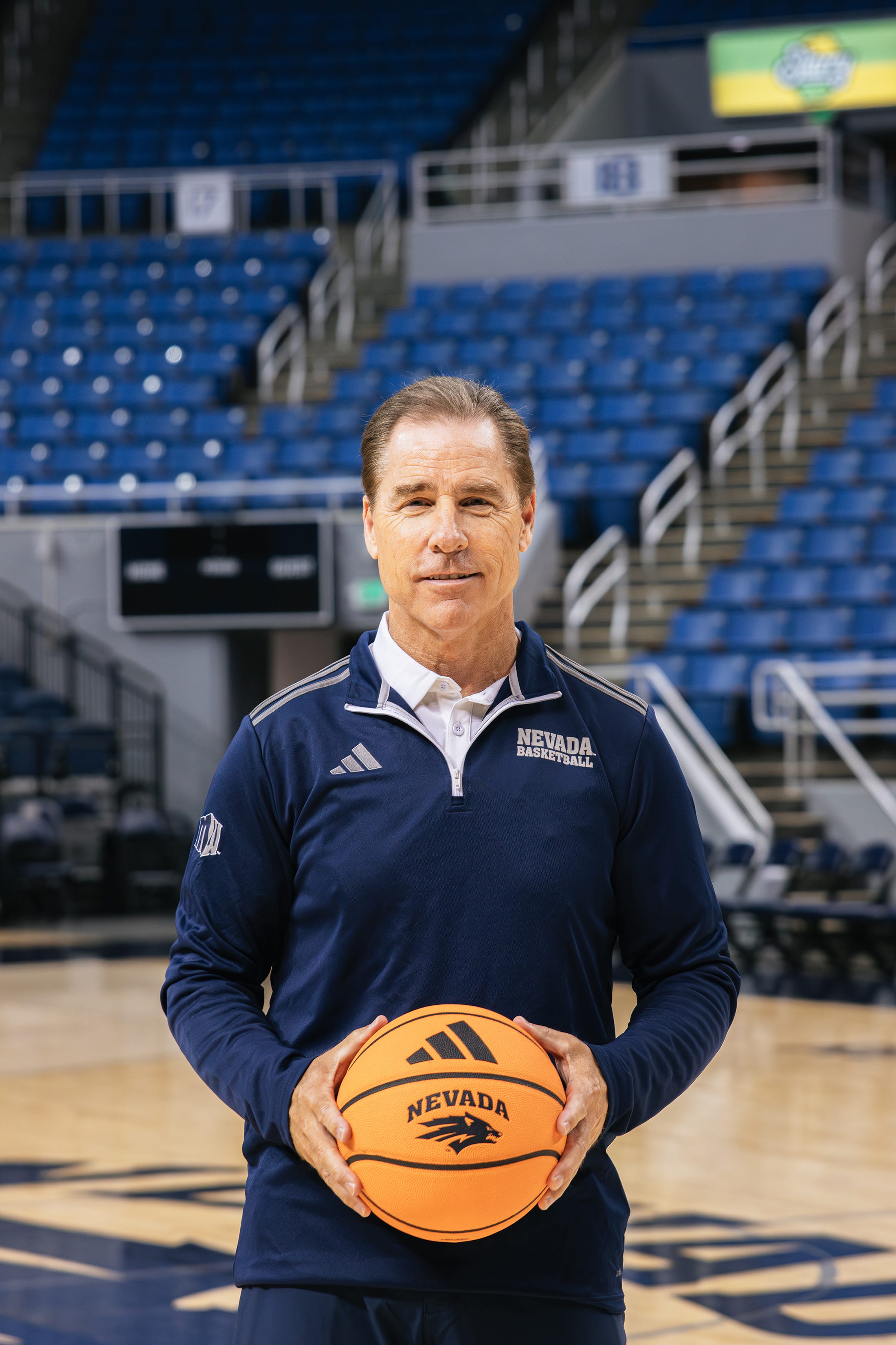 Nevada hires alum as new women's basketball coach