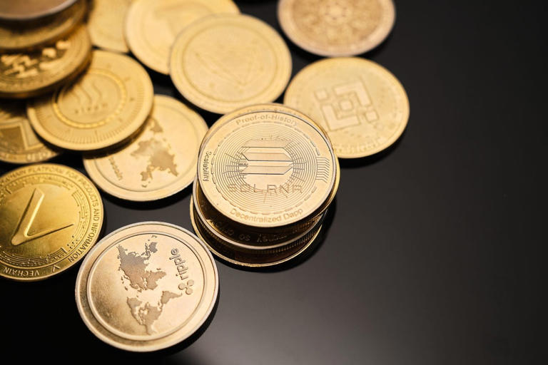 We asked AI to pick the best crypto to buy right now: XRP, Bitcoin, or ...