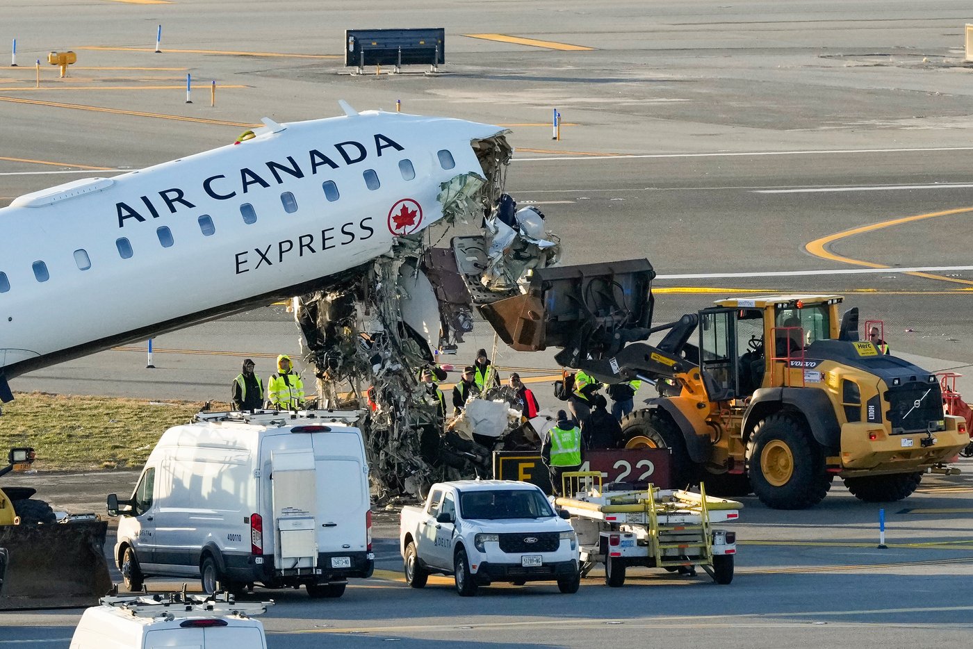 Photos show the scene of a collision on a runway at LaGuardia Airport ...
