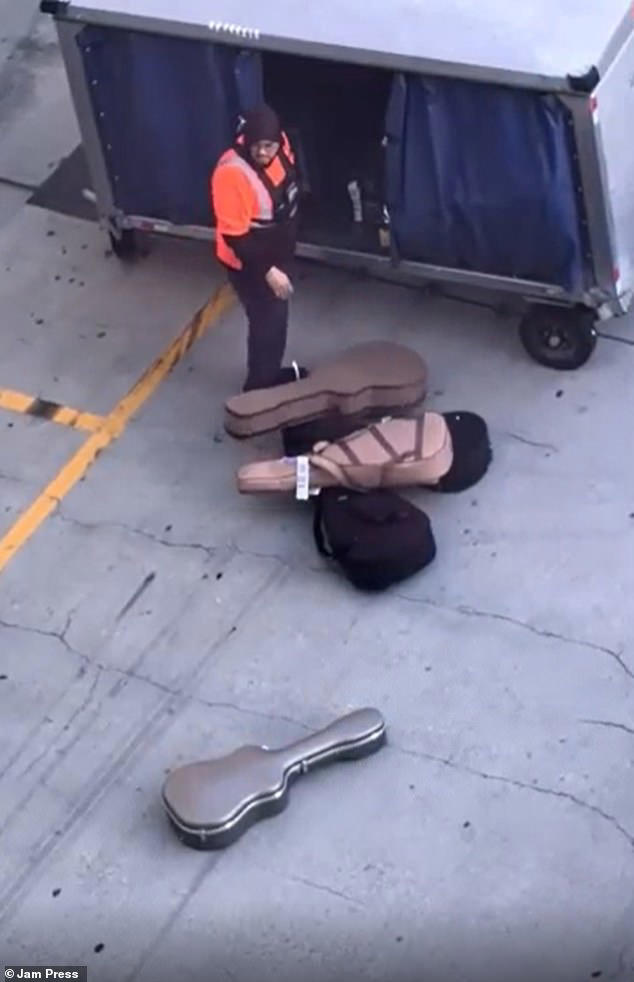 Traveler astonished as LAX baggage handler seen carelessly throwing ...