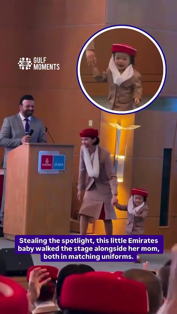 Emirates graduate receives diploma with baby daughter