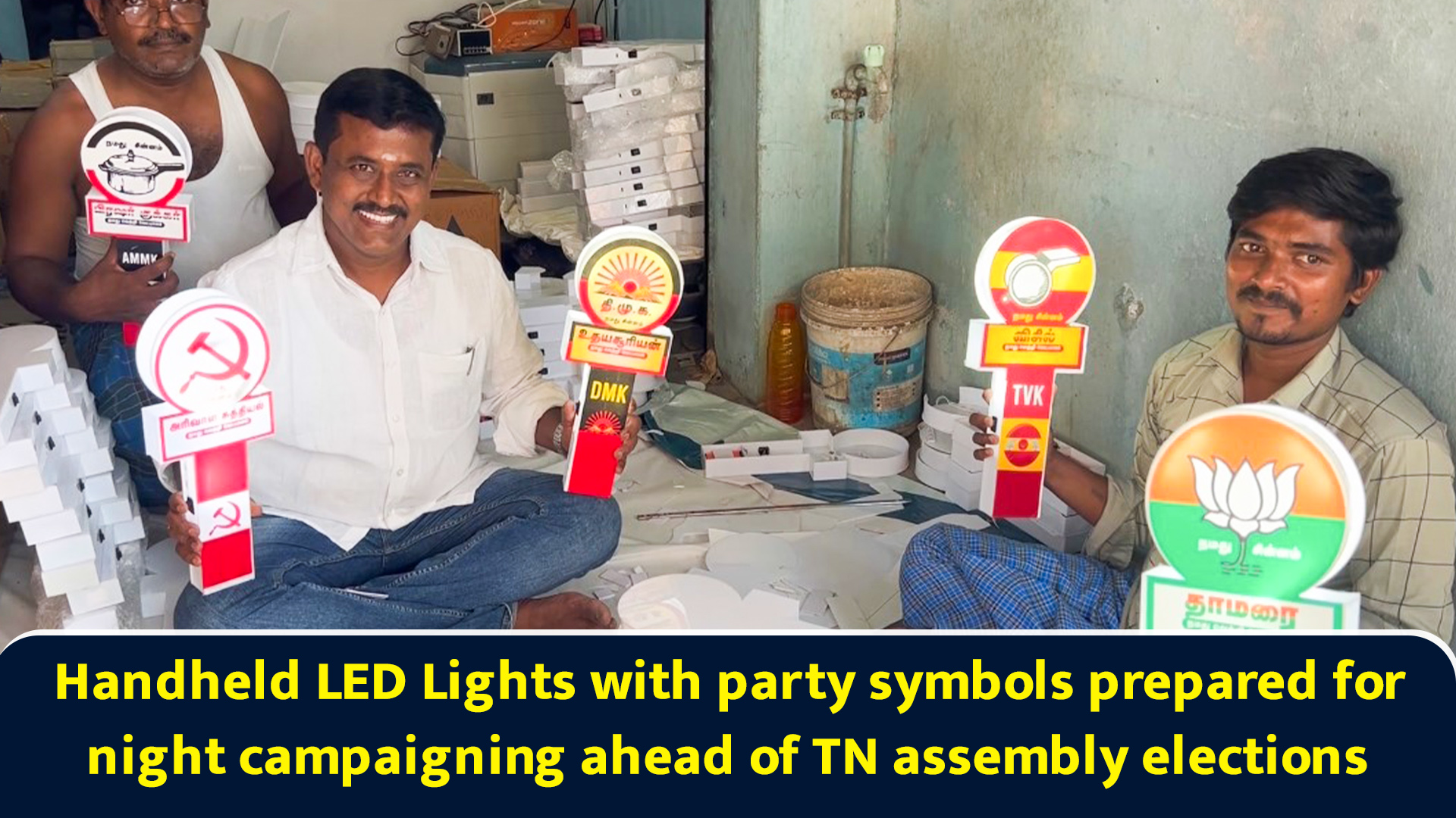 Handheld LED lights with party symbols prepared for night campaigning ...