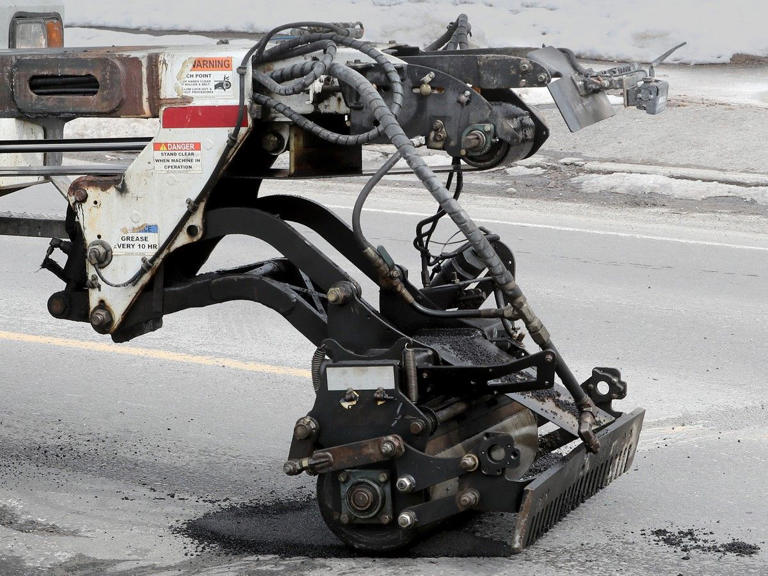 How Ottawa patches potholes with a Dr. Seuss-like machine called the ...