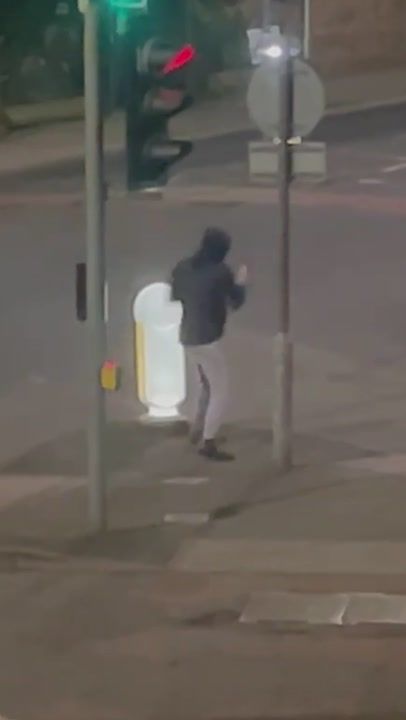 Man tries to fight traffic bollard on UK road - but it fights back