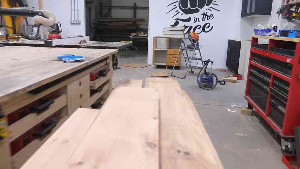 Watch him turn free junk cabinets into custom shop storage with scrap wood