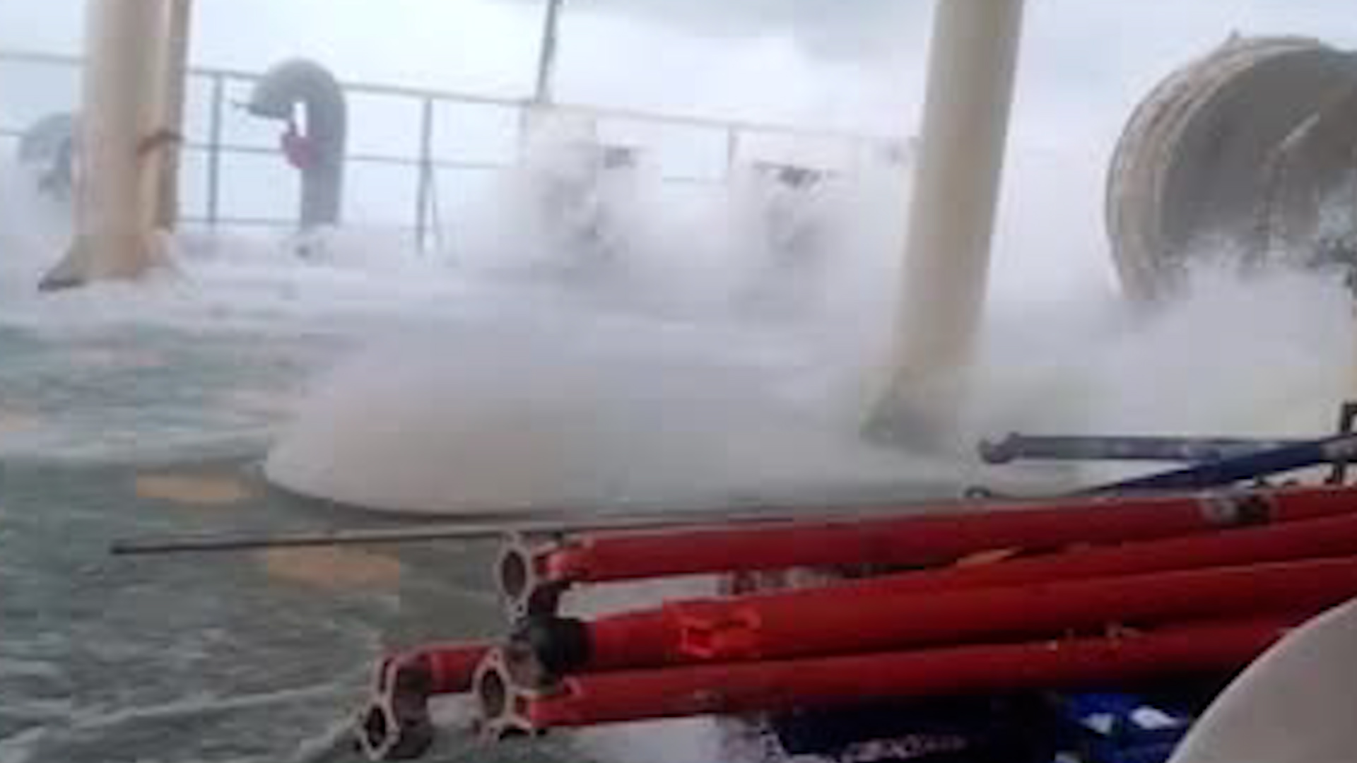 Rough waves flood ship deck during North Atlantic storms