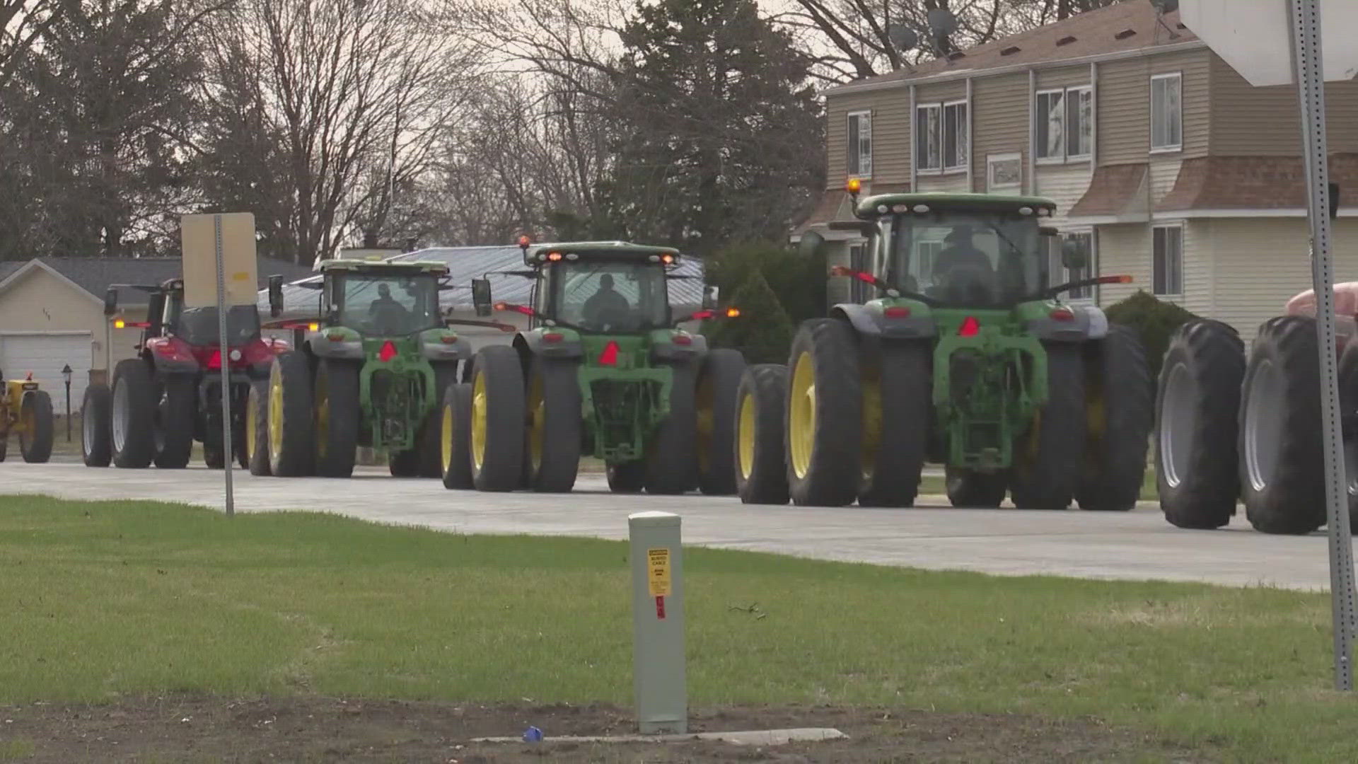 Students in Iowa form a tractorcade for National Agriculture Day