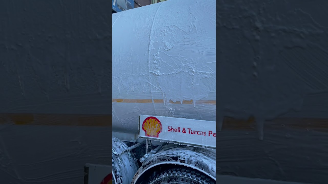 Carefully washing a petrol delivery truck!