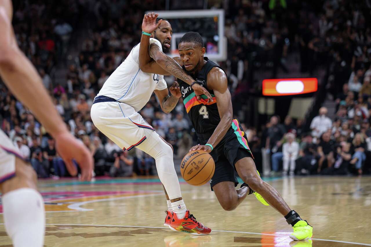 Spurs veteran guard De'Aaron Fox sacrificing numbers in pursuit of ...